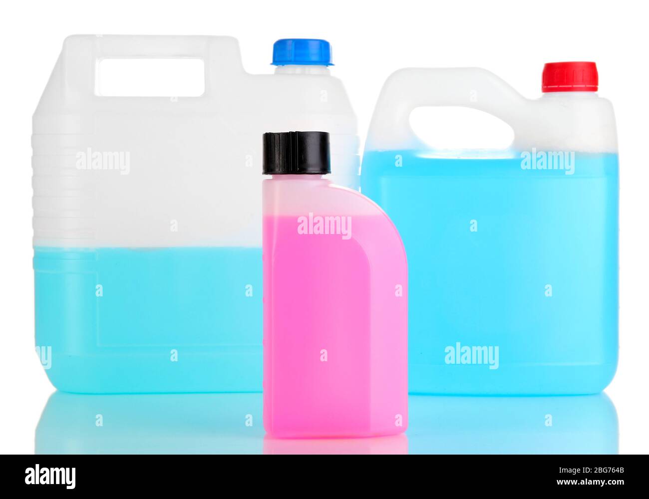 Different liquids for car in canisters isolated on white Stock Photo ...