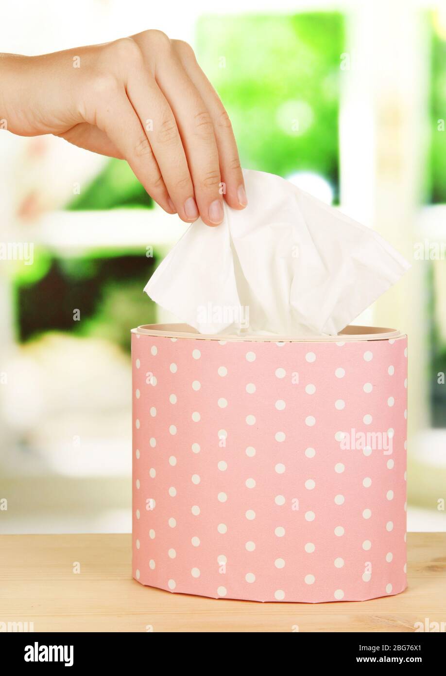 Cleaning wipes on window background Stock Photo - Alamy