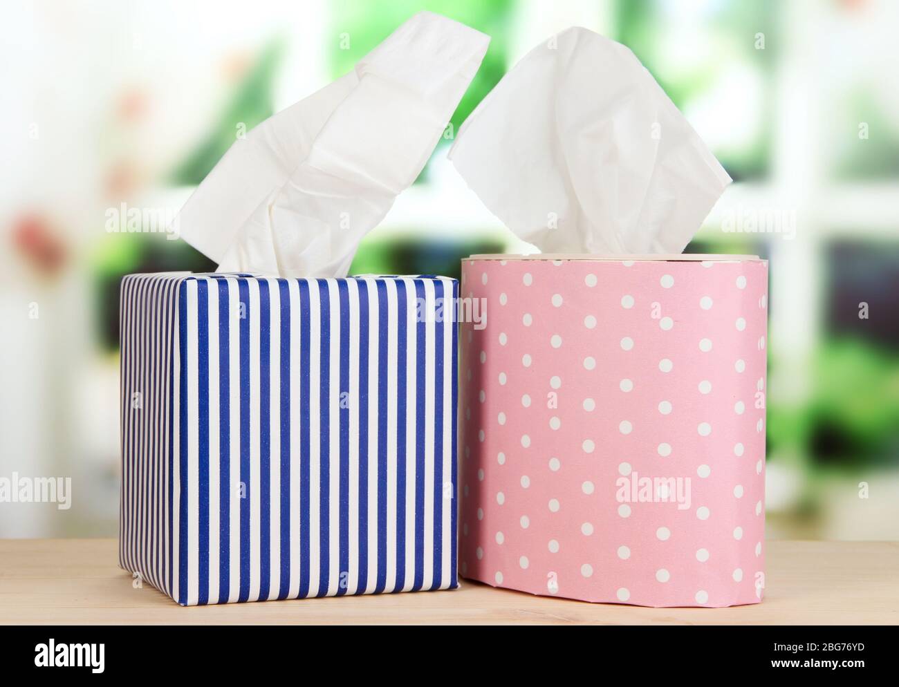 Cleaning wipes on window background Stock Photo - Alamy