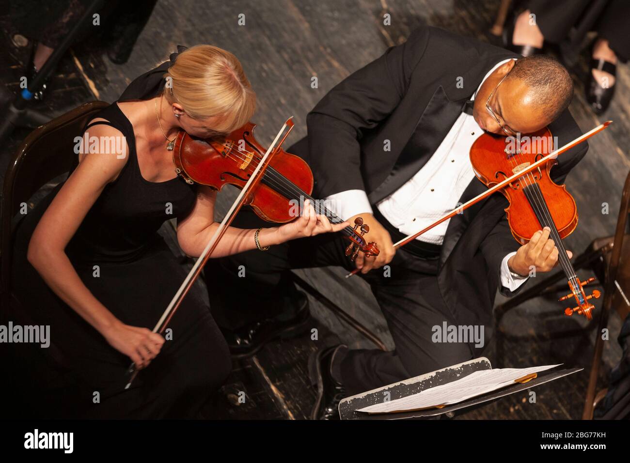 High angle view of violins performing (model released) in classical ...