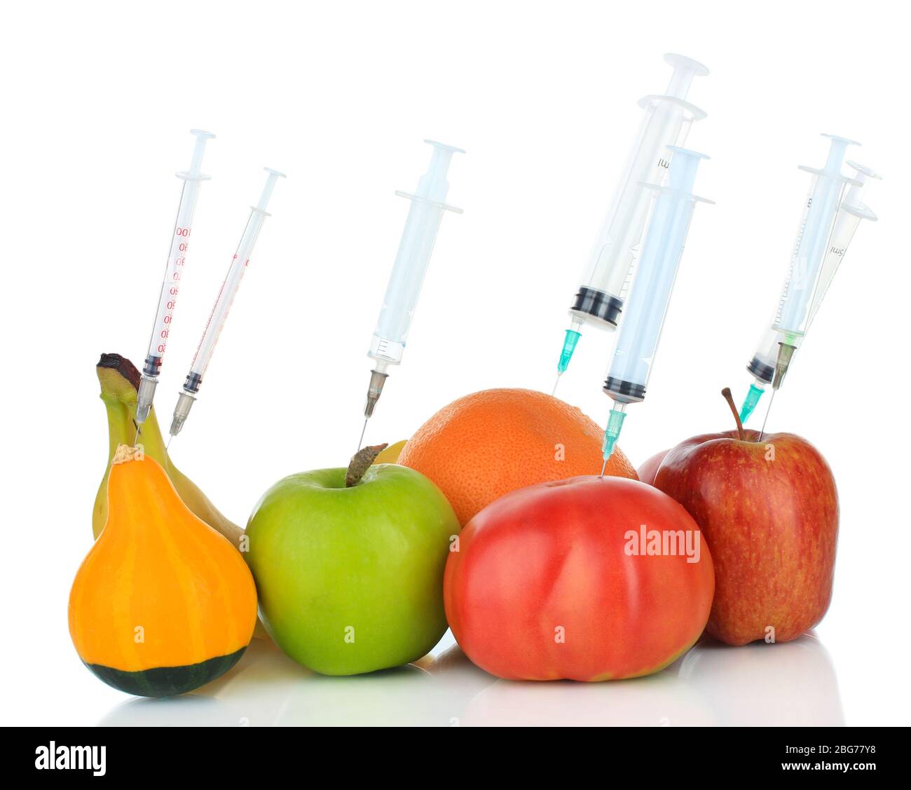Injection into fruit and vegetables isolated on white Stock Photo - Alamy
