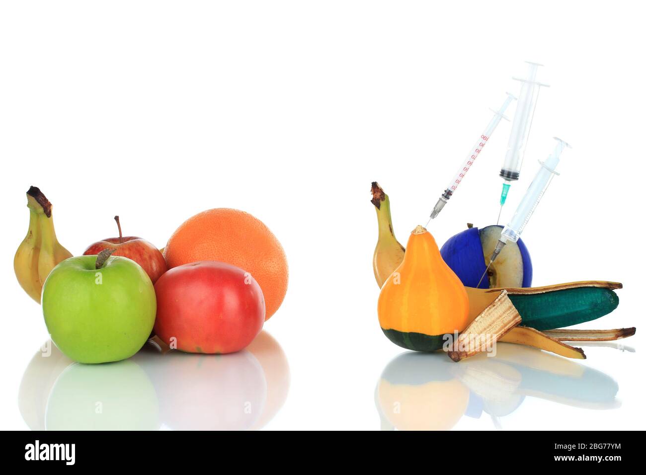 Injection into fruit and vegetables isolated on white Stock Photo - Alamy