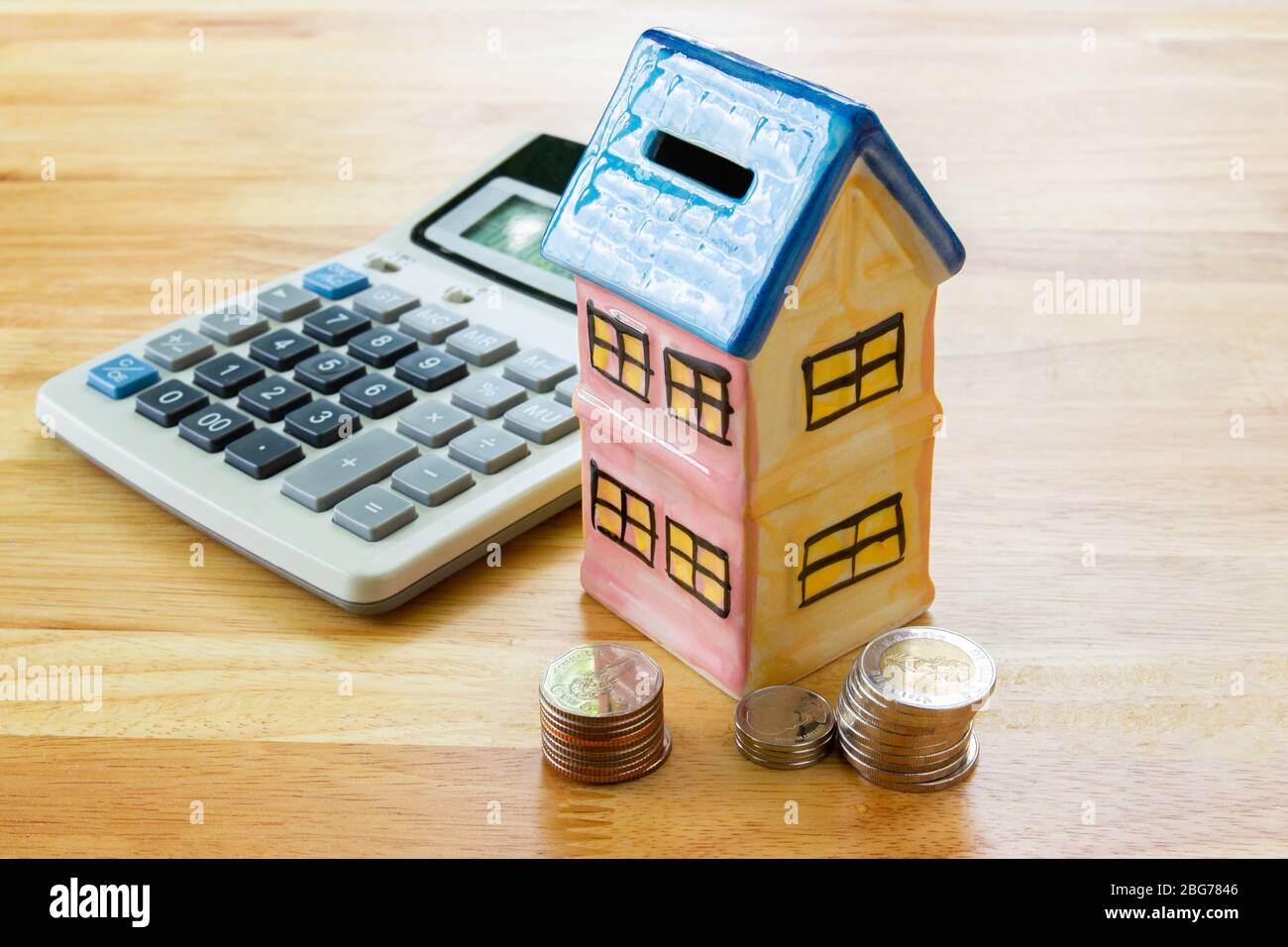 Model house with calculator, concept Buying a house, residence ...