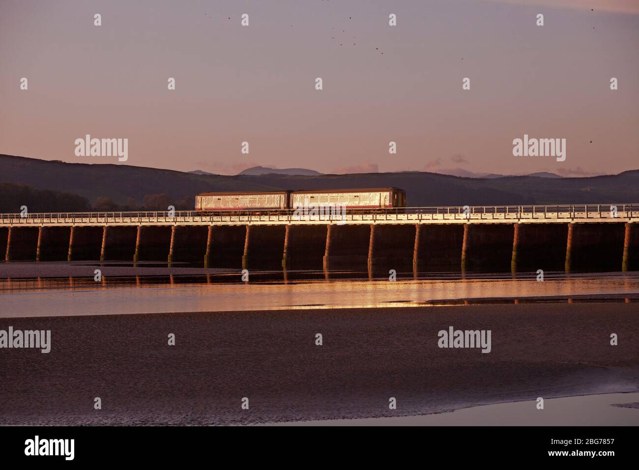 Northern rail class 156 super sprinter train crossing Arnside viaduct ...