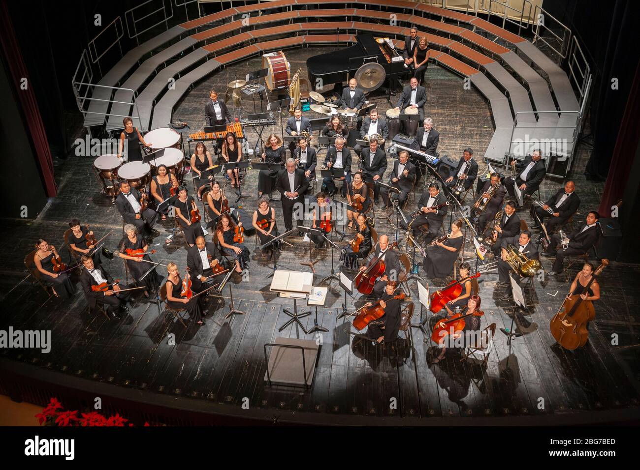 Standing Orchestra and Conductor Group Portrait (all model released) of ...