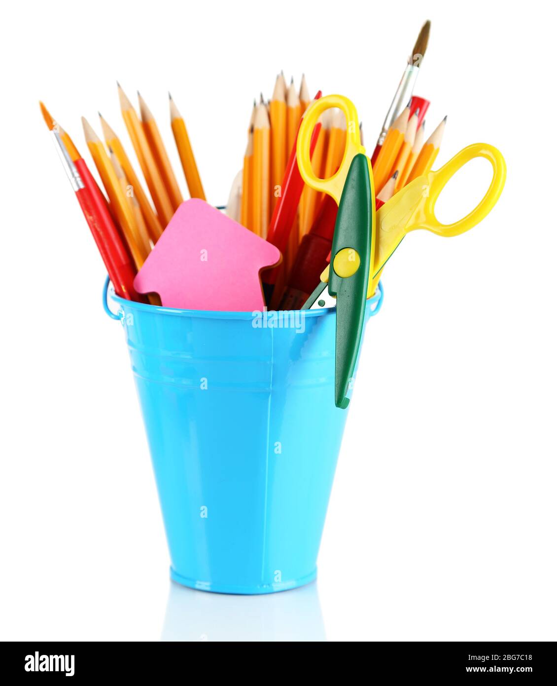 Colorful pencils and other art supplies in pail isolated on white Stock ...