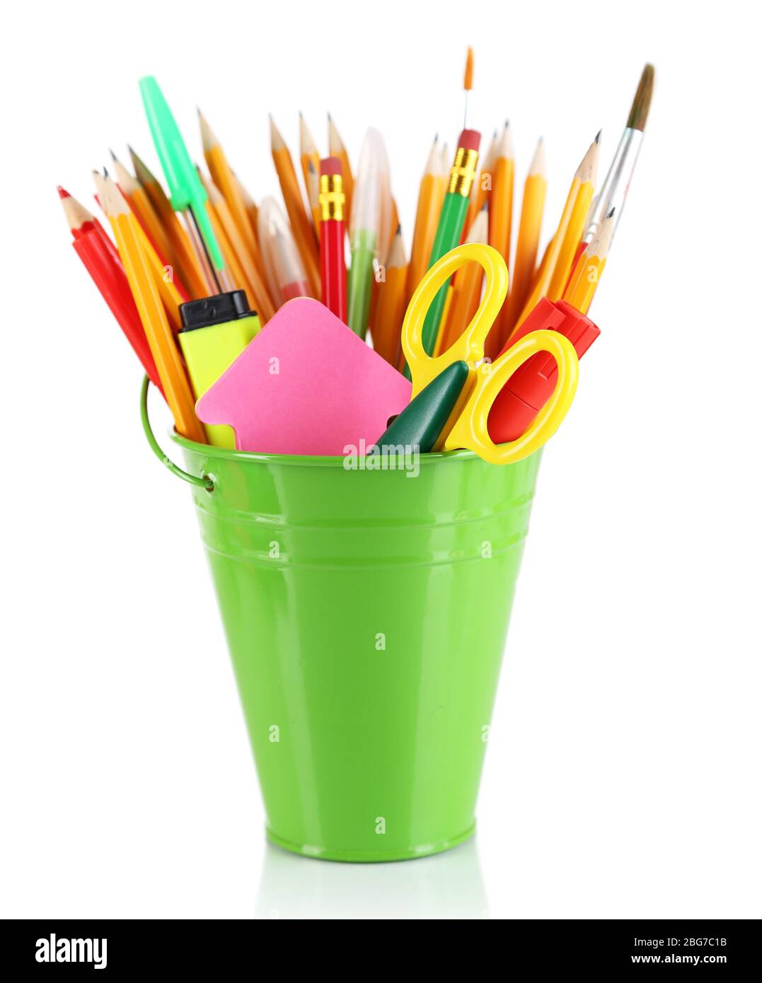 Colorful pencils and other art supplies in pail isolated on white Stock ...