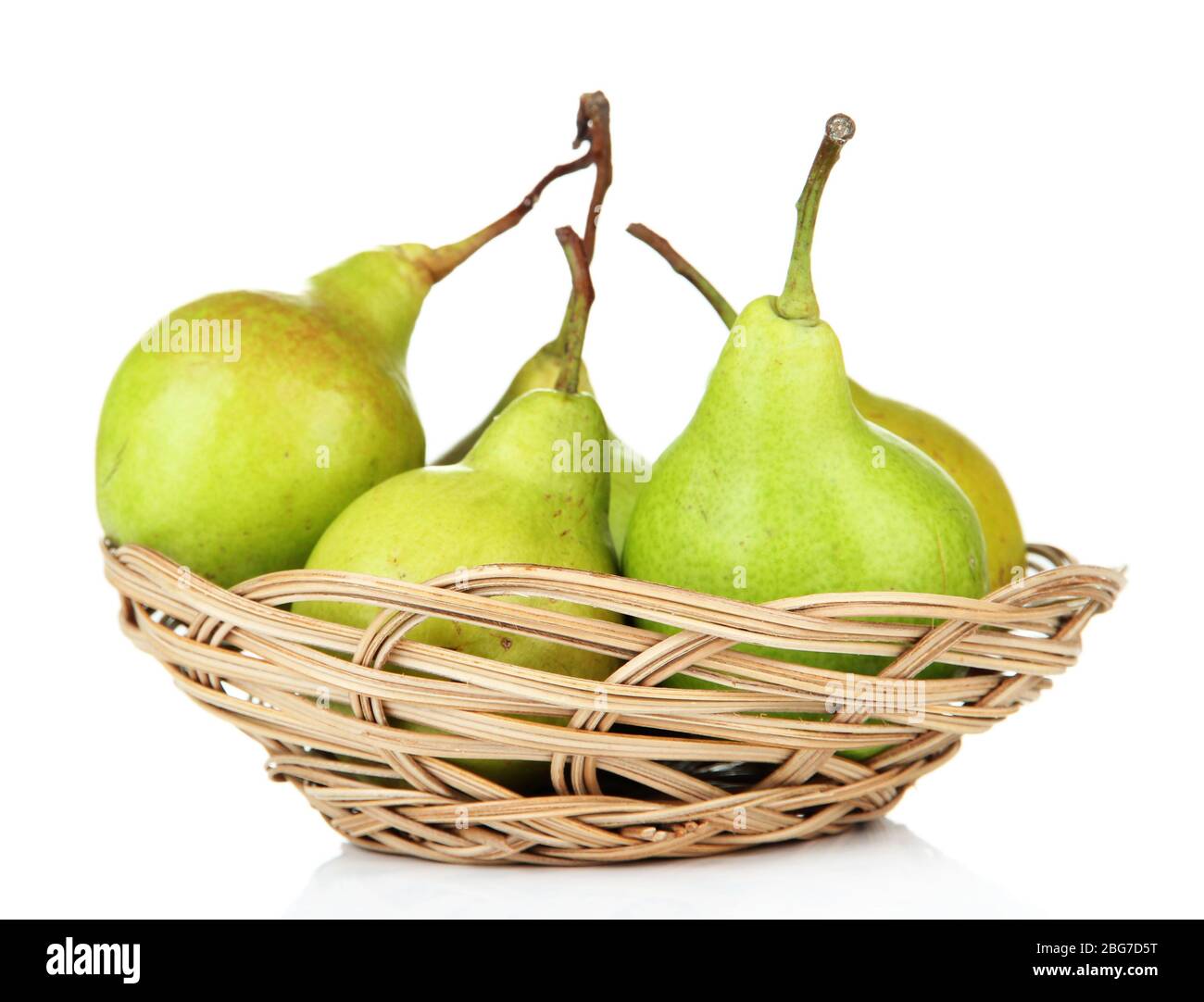 Green pears in basket Cut Out Stock Images & Pictures - Alamy