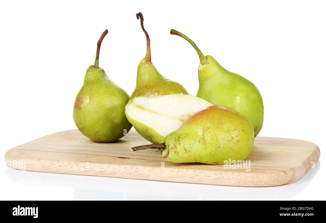 Pears on wooden cutting board, isolated on white Stock Photo - Alamy