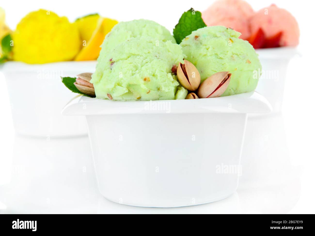 Tasty ice cream scoops in bowls, isolated on white Stock Photo - Alamy