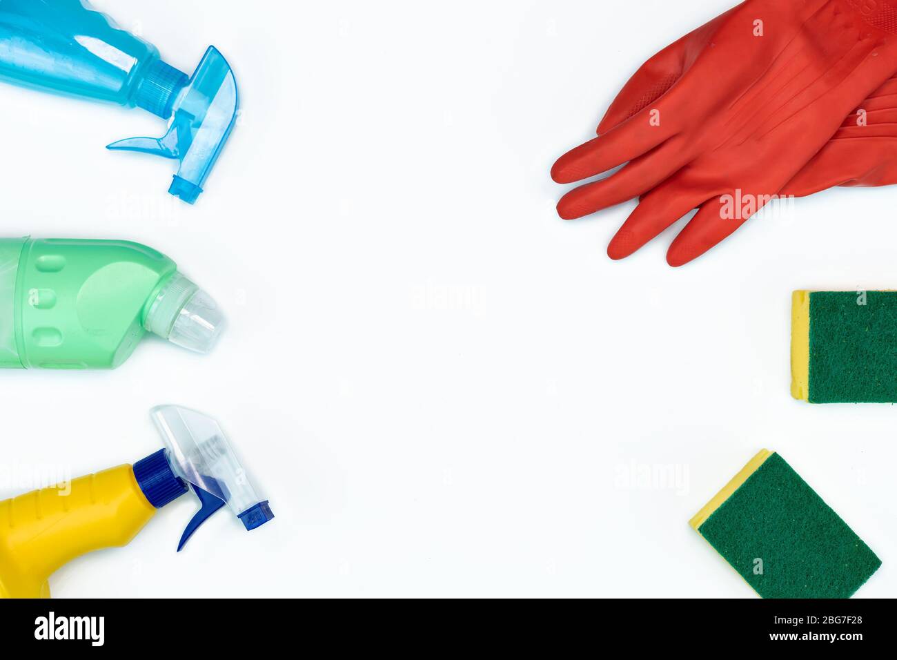 flat-lay of Cleaning supplies on white background. Detergents for or ...