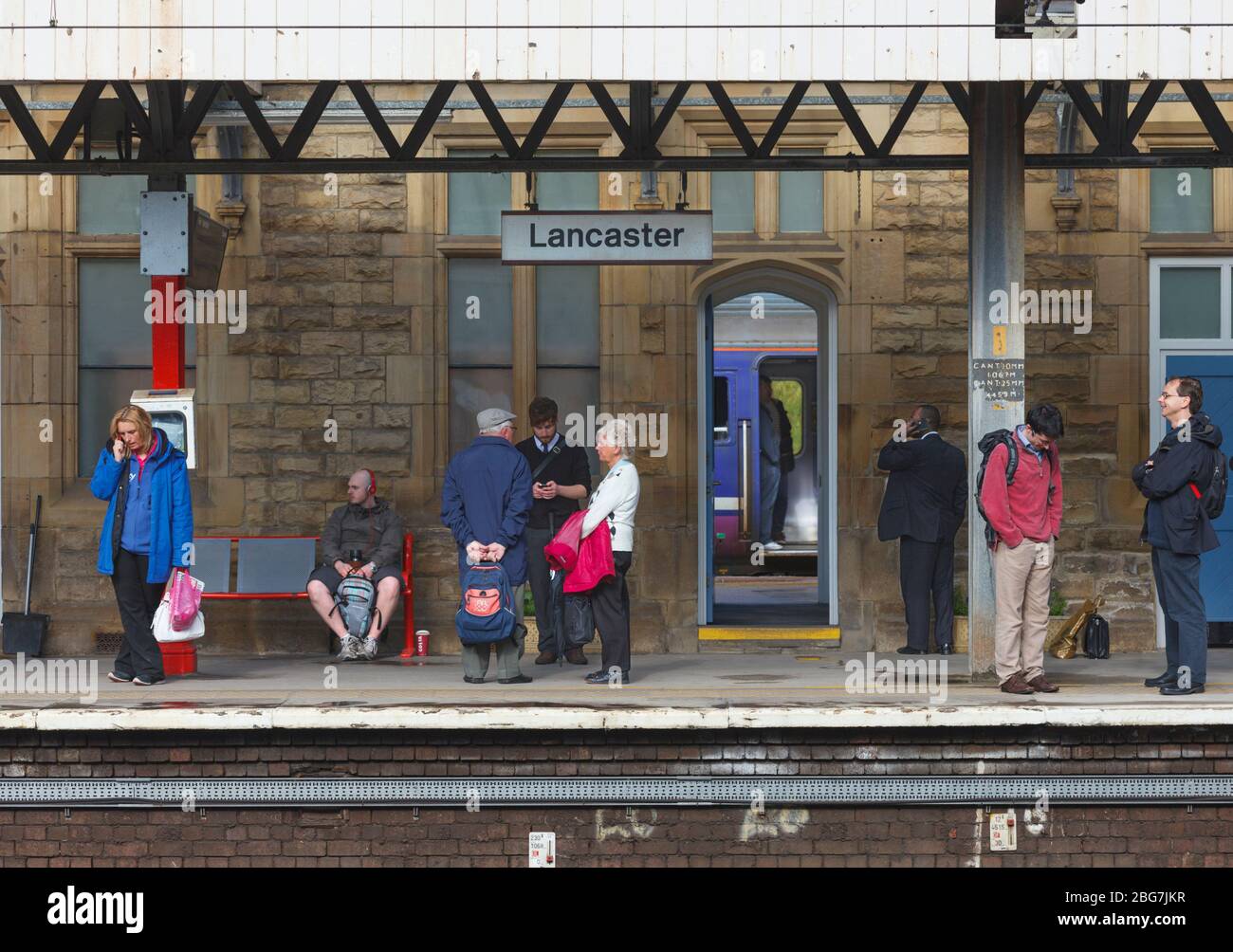 Passengers at Lancaster railway station on the west coast mainline ...