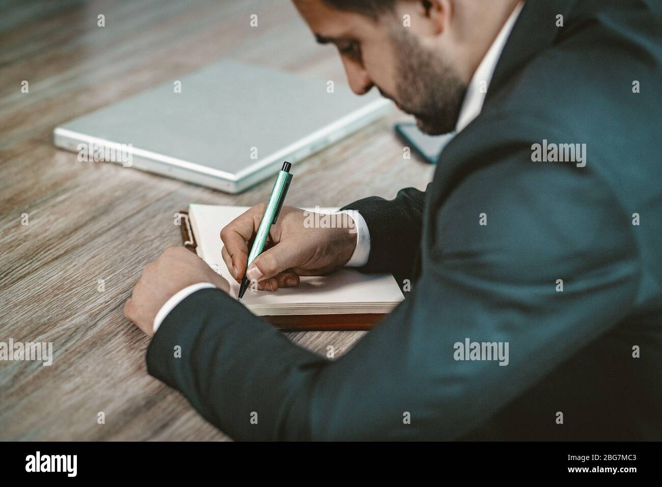 Businessman holding tablet pen in hi-res stock photography and images ...