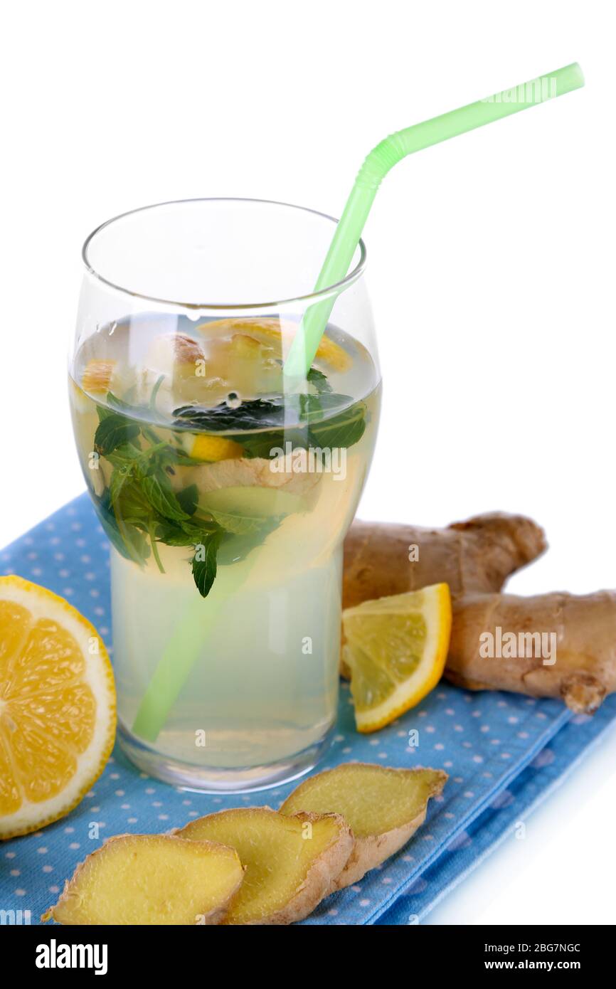 Glass of cold tea with ginger on napkin isolated on white Stock Photo ...