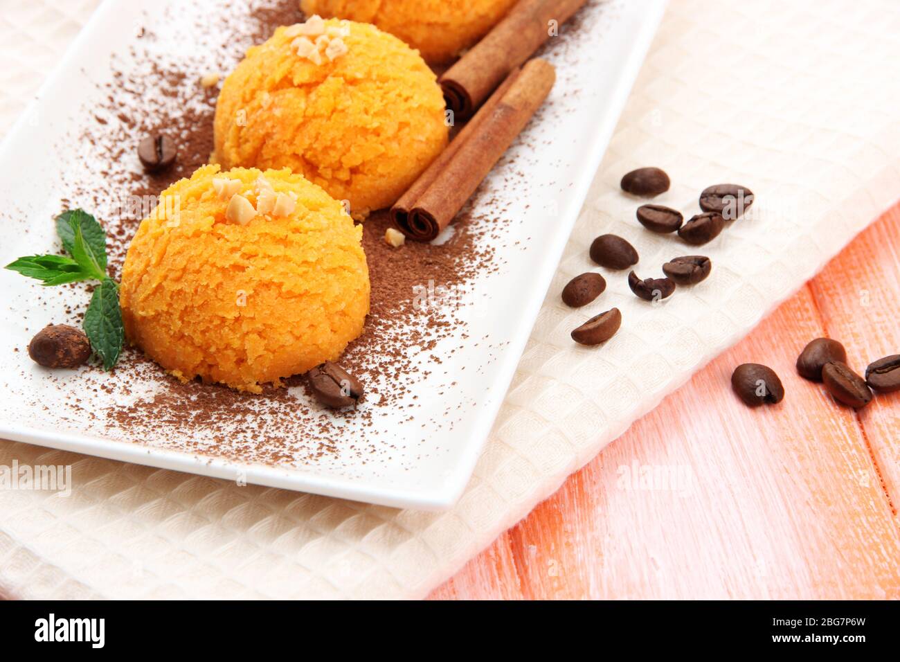 Delicious ice cream on plate on table close-up Stock Photo - Alamy