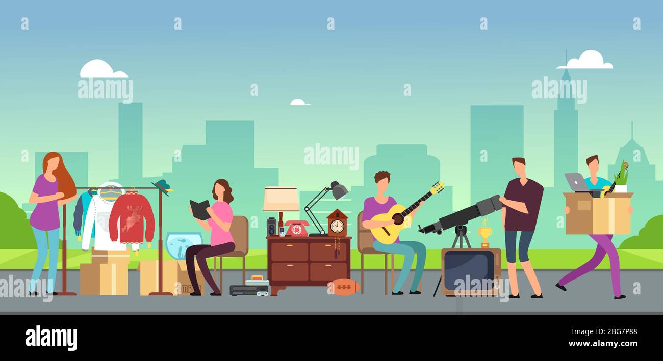 People selling and shopping second hand clothes, vintage goods at flea ...