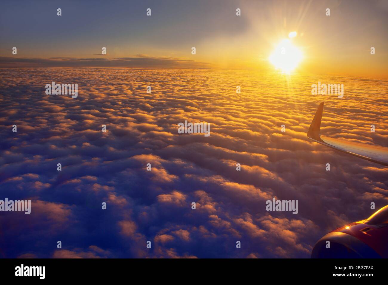 view of majestic sunset from airplane window Stock Photo - Alamy