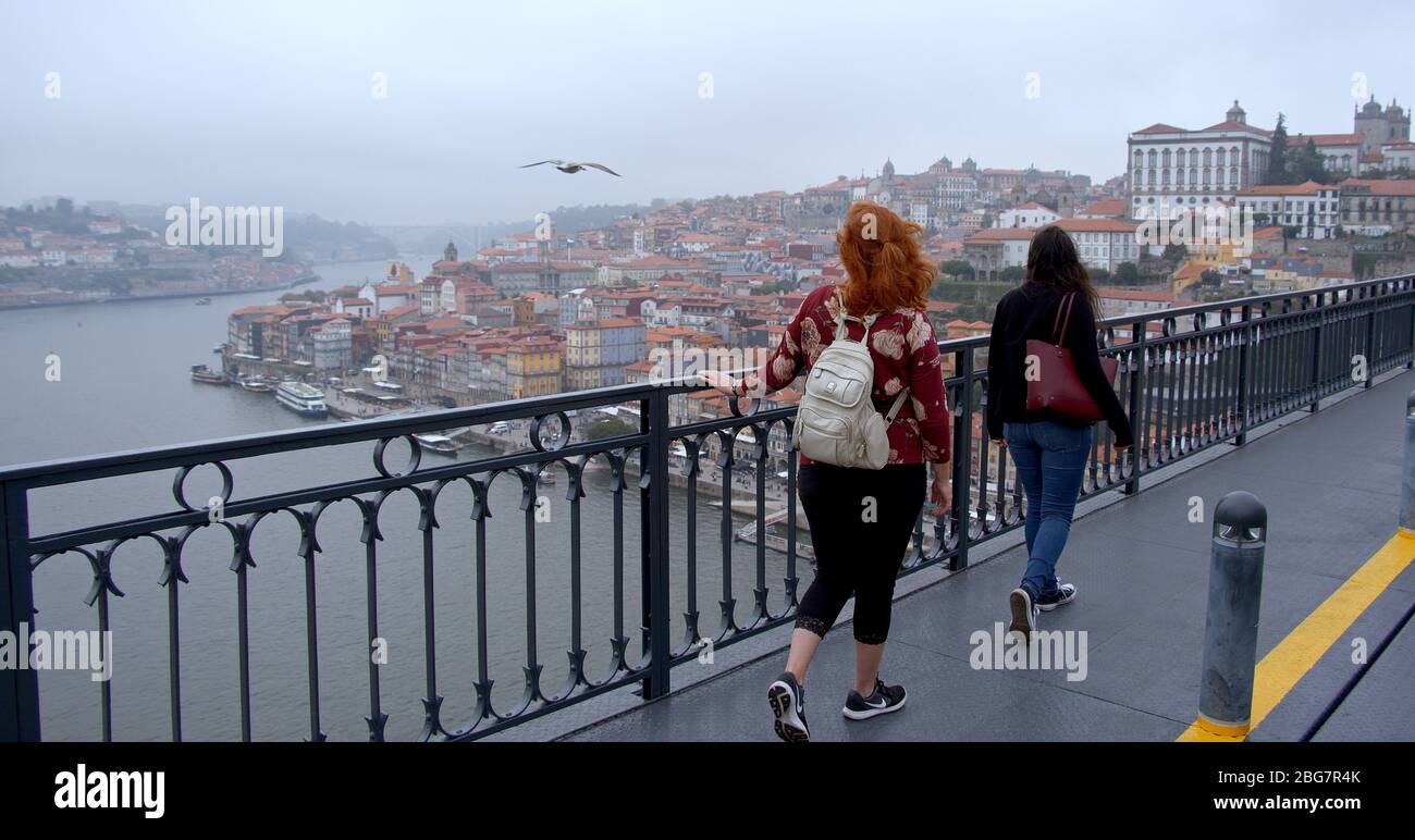 Walking over Dom Luis Bridge in Porto Stock Photo - Alamy