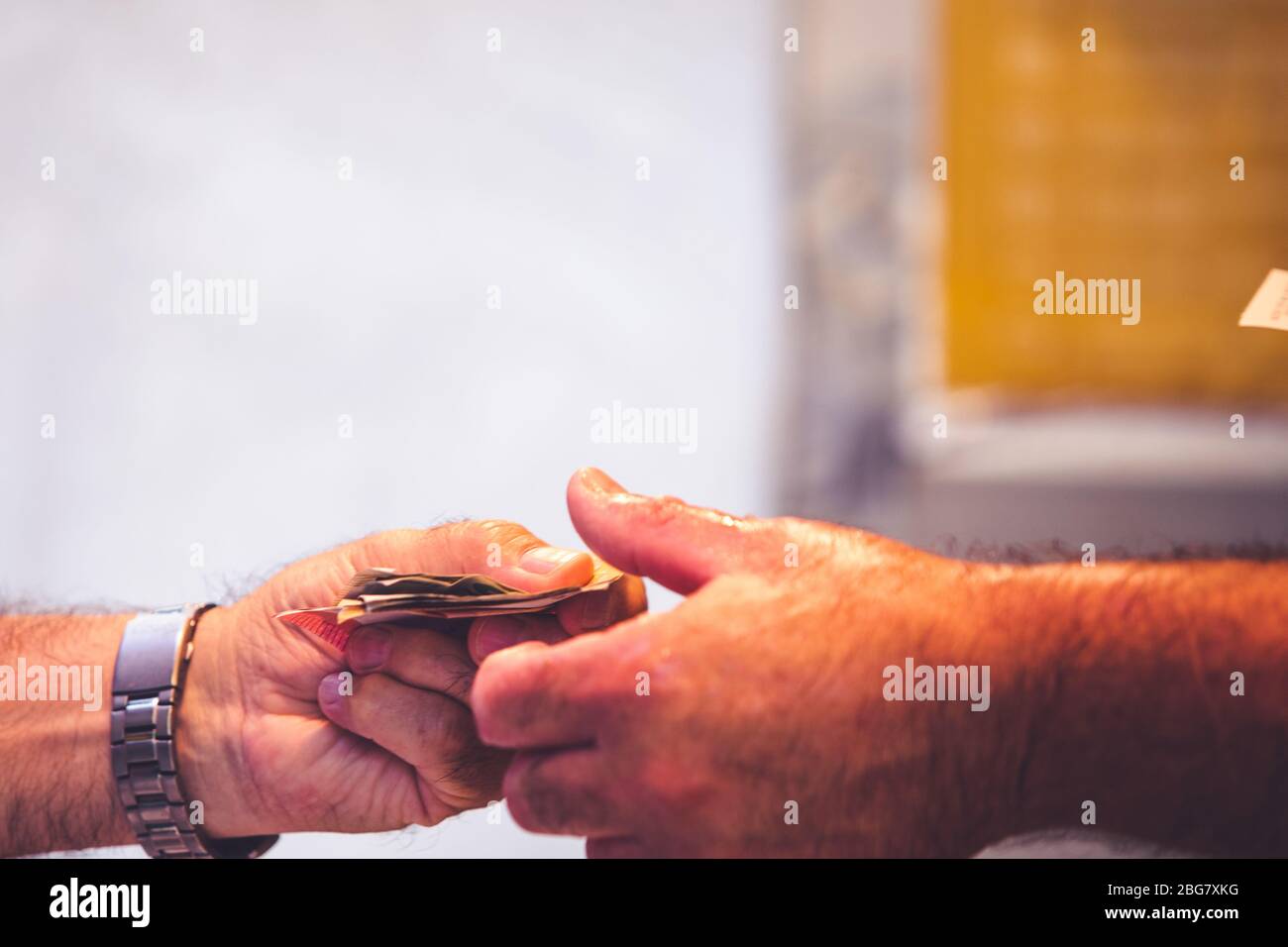 People paying with cash in a Market Stock Photo - Alamy