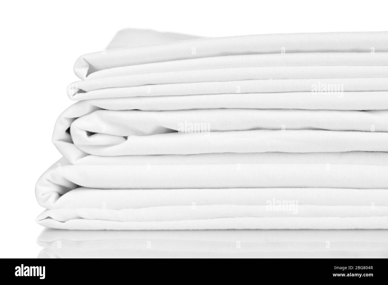 Stack of clean bedding sheets isolated on white Stock Photo - Alamy