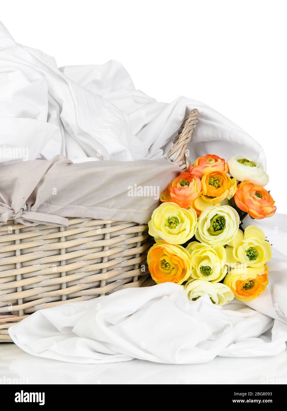 Rumpled bedding sheets in wicker basket isolated on white Stock Photo ...