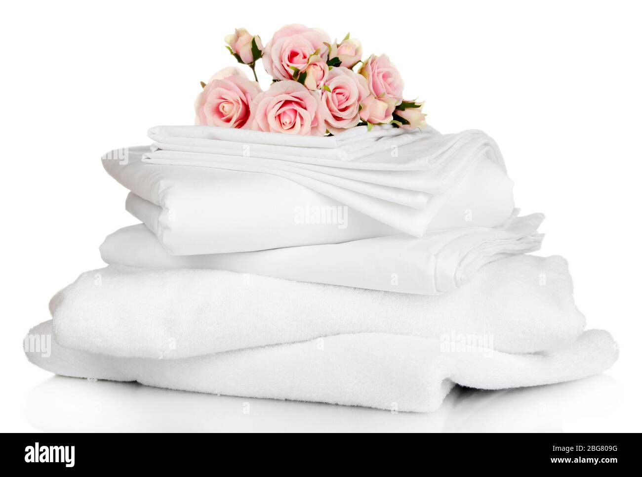Stack of clean bedding sheets and towels isolated on white Stock Photo ...