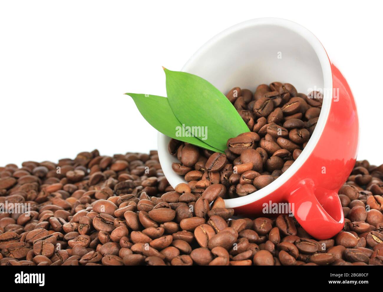 Coffee beans in cup on white background Stock Photo - Alamy