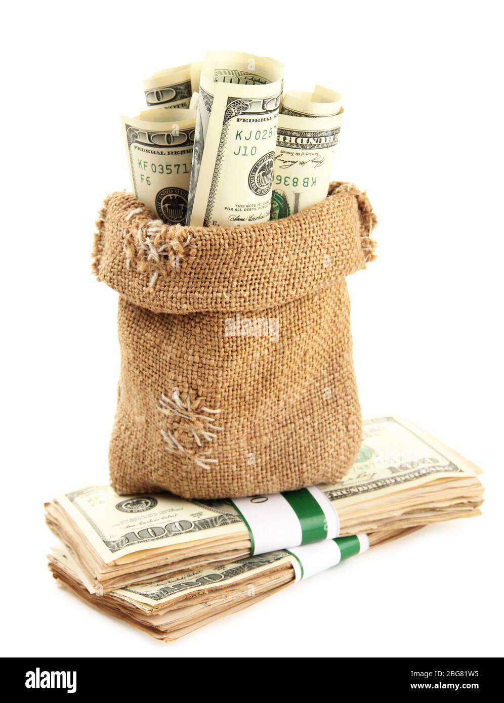Money in bag isolated on white Stock Photo - Alamy