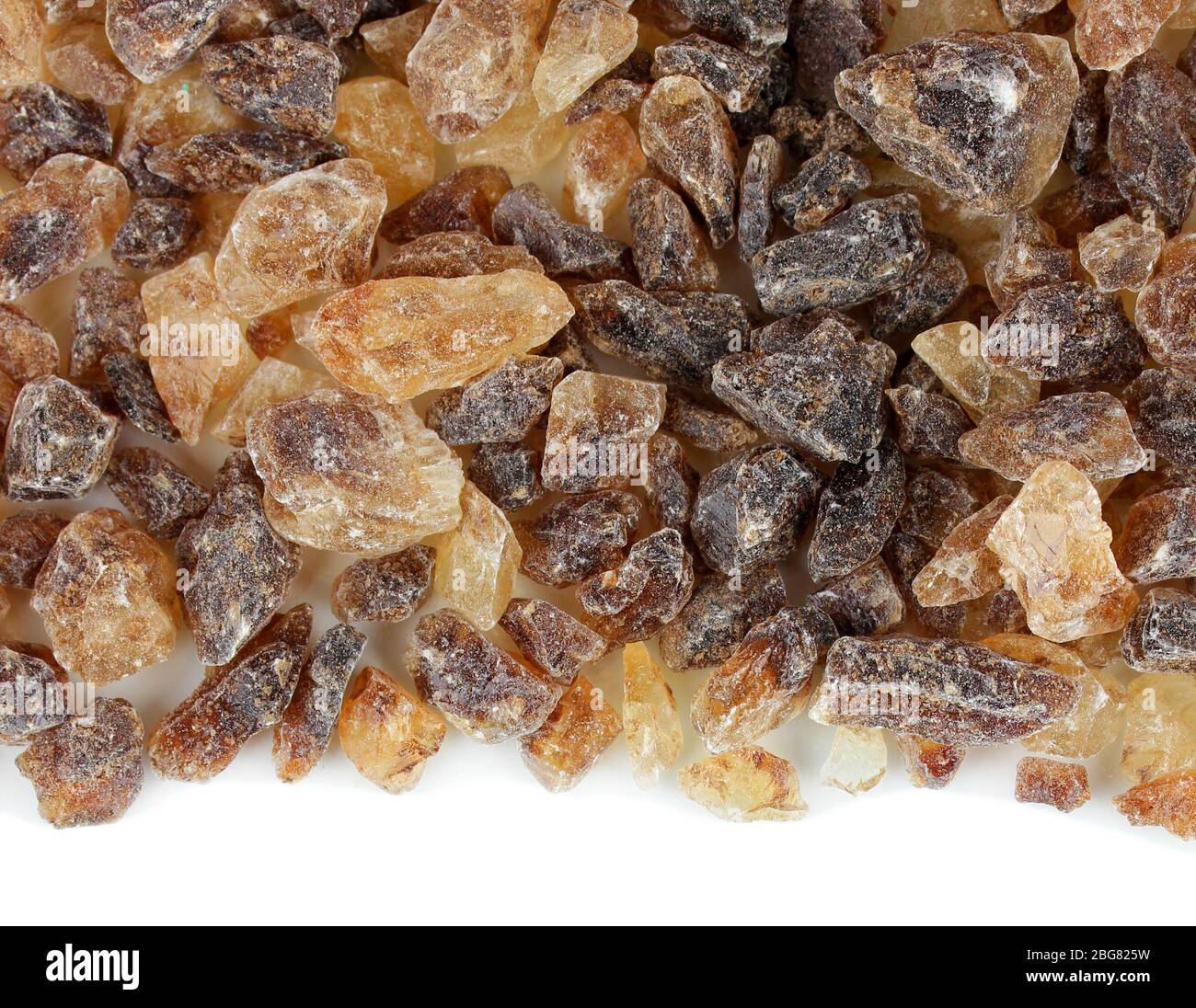 Caramelized sugar on white background Stock Photo - Alamy