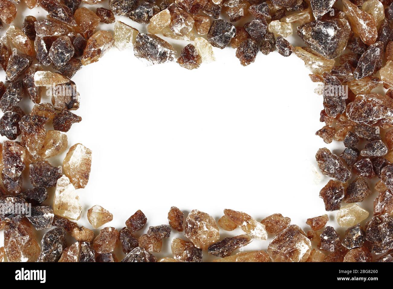 Caramelized sugar on white background Stock Photo - Alamy