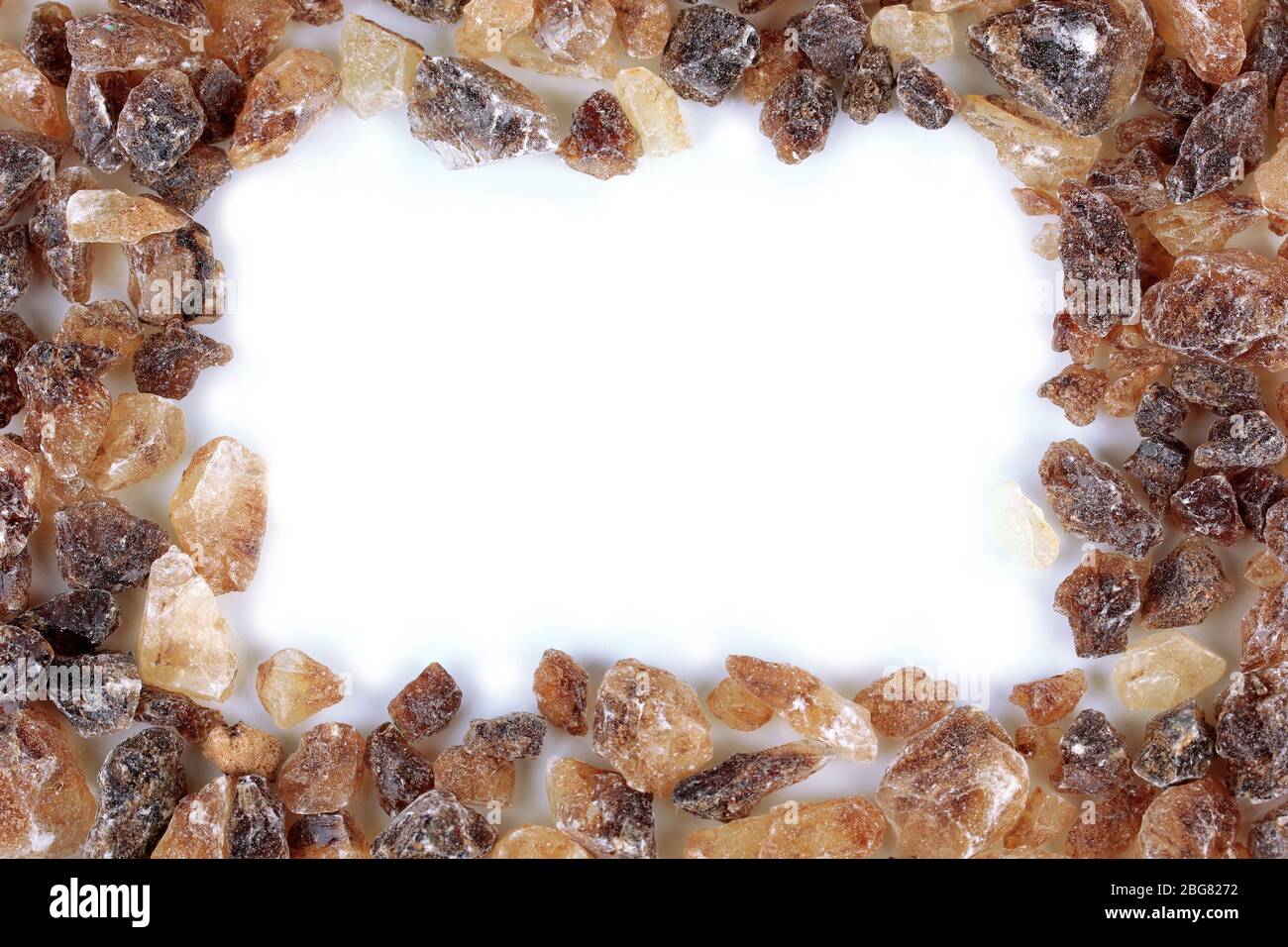 Caramelized sugar on white background Stock Photo - Alamy