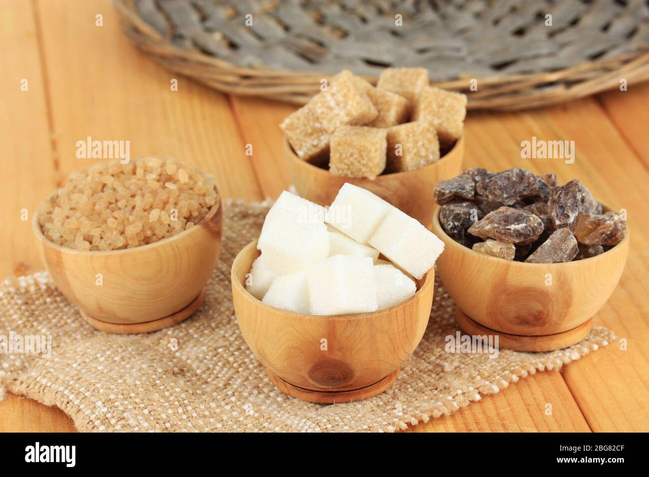 Different types of sugar in bowls on table close-up Stock Photo - Alamy
