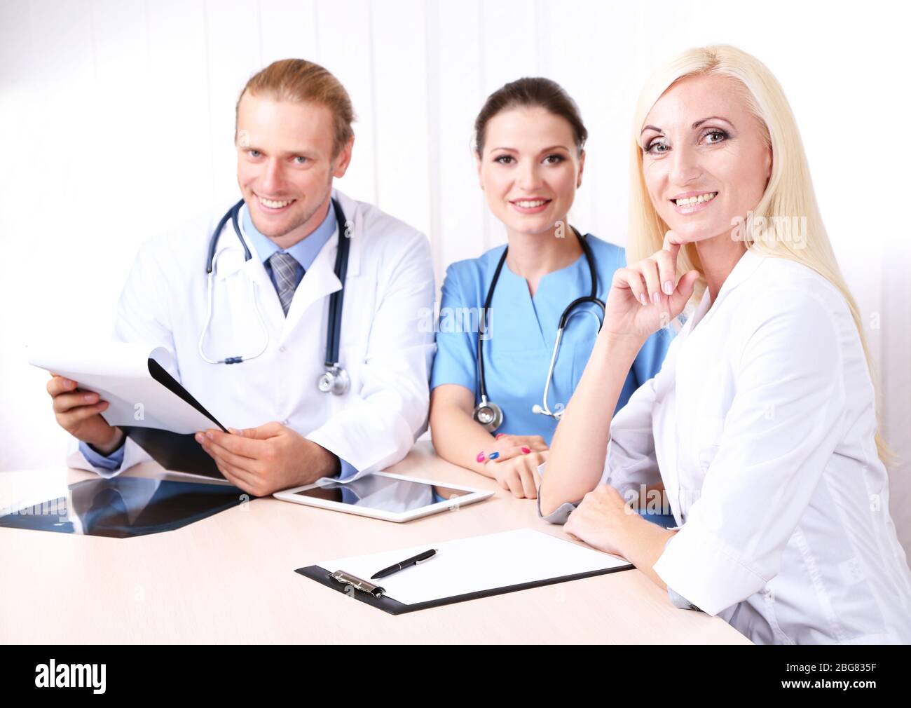 Medical team during meeting in office Stock Photo - Alamy