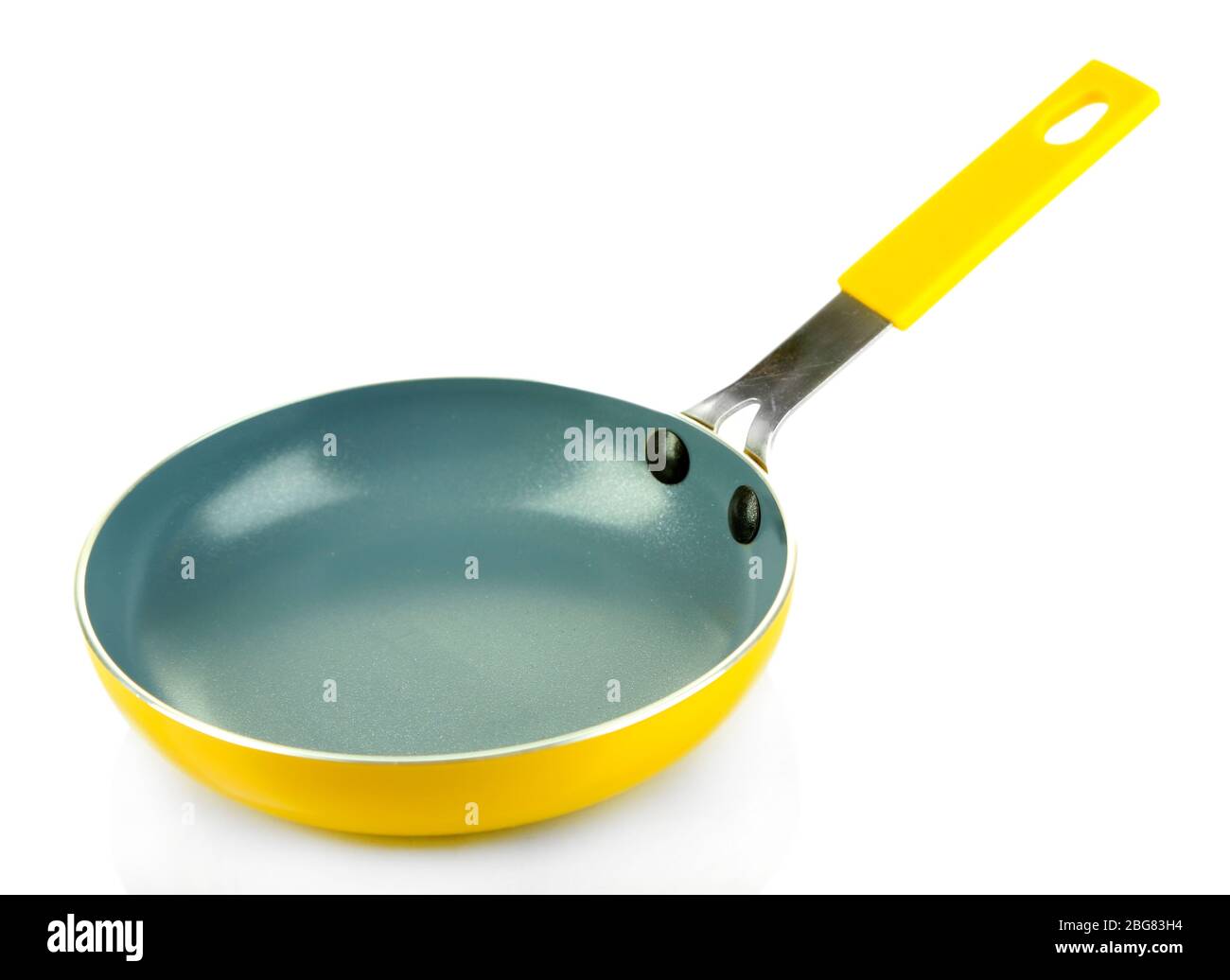 Little yellow pan isolated on white Stock Photo - Alamy
