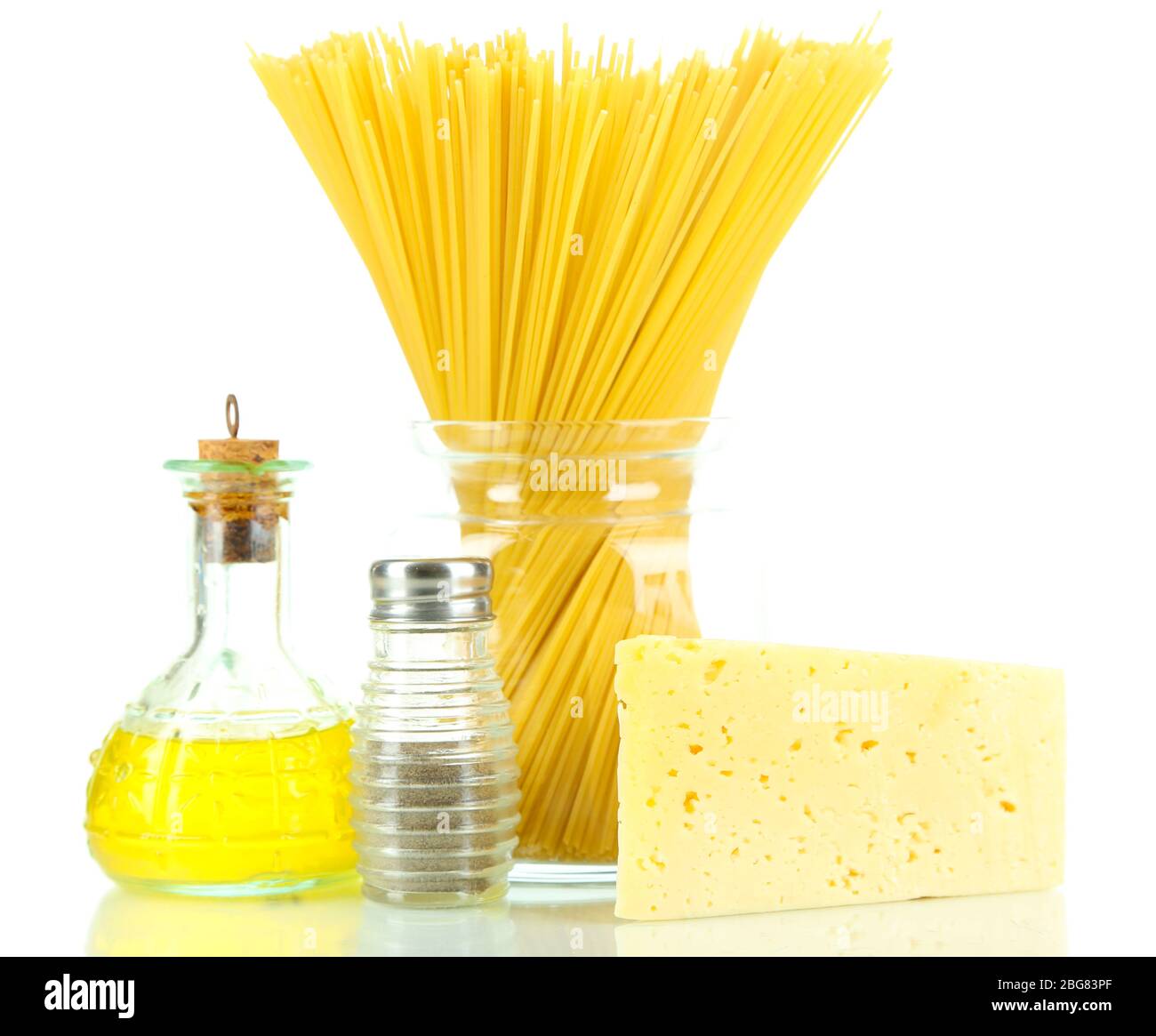 Pasta spaghetti with spices and oil isolated on white Stock Photo - Alamy