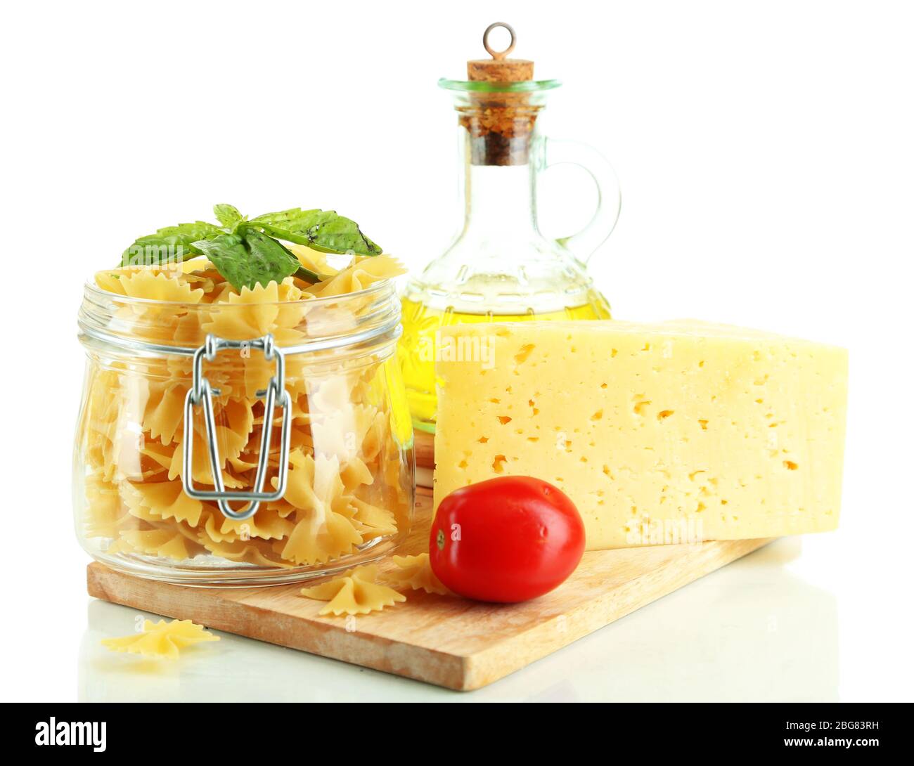 Pasta with oil, cheese and vegetables isolated on white Stock Photo - Alamy
