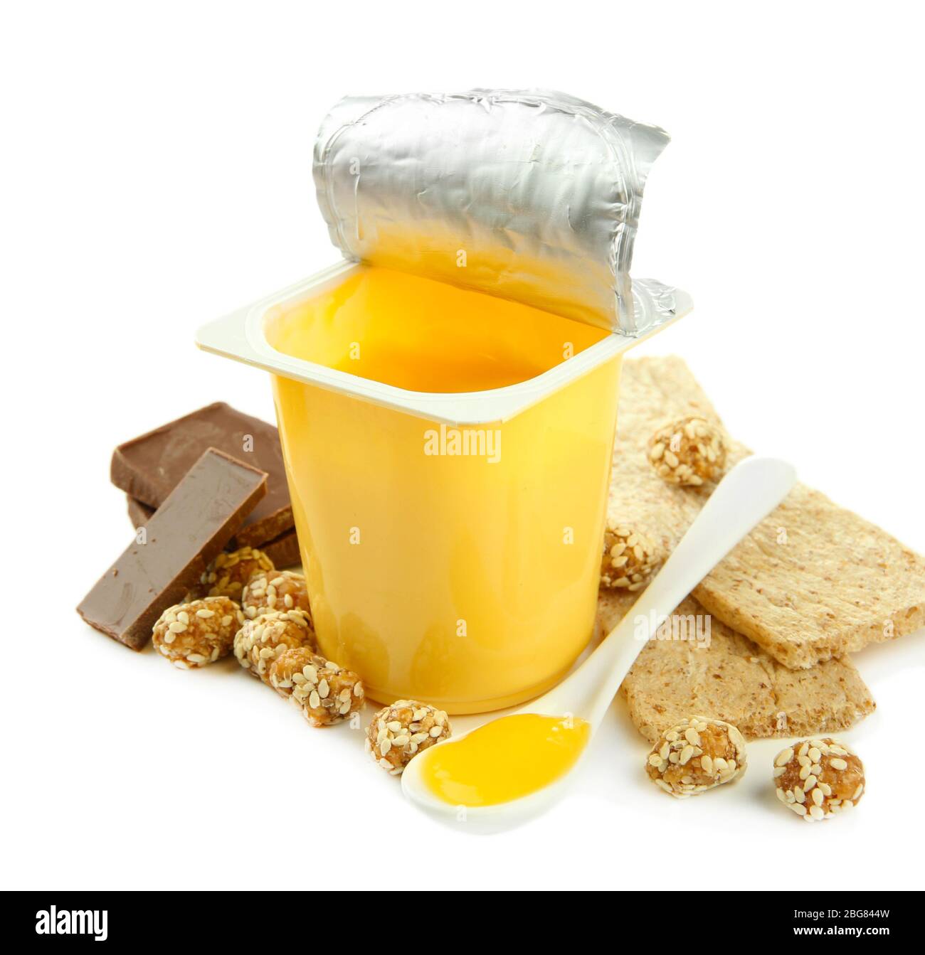 Tasty yogurt in open plastic cup isolated on white Stock Photo - Alamy