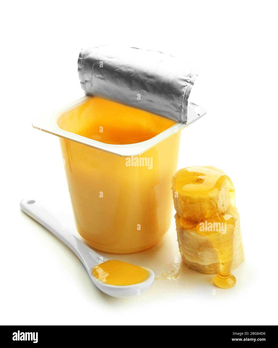 Tasty dessert in open plastic cup and banana, isolated on white Stock ...