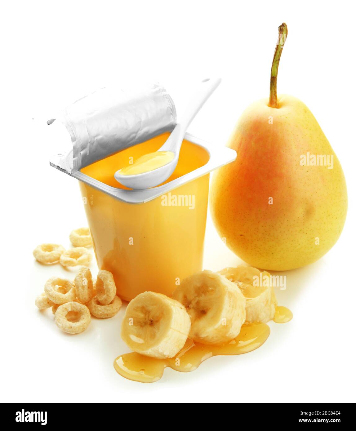 Tasty dessert in open plastic cup and pear, isolated on white Stock ...