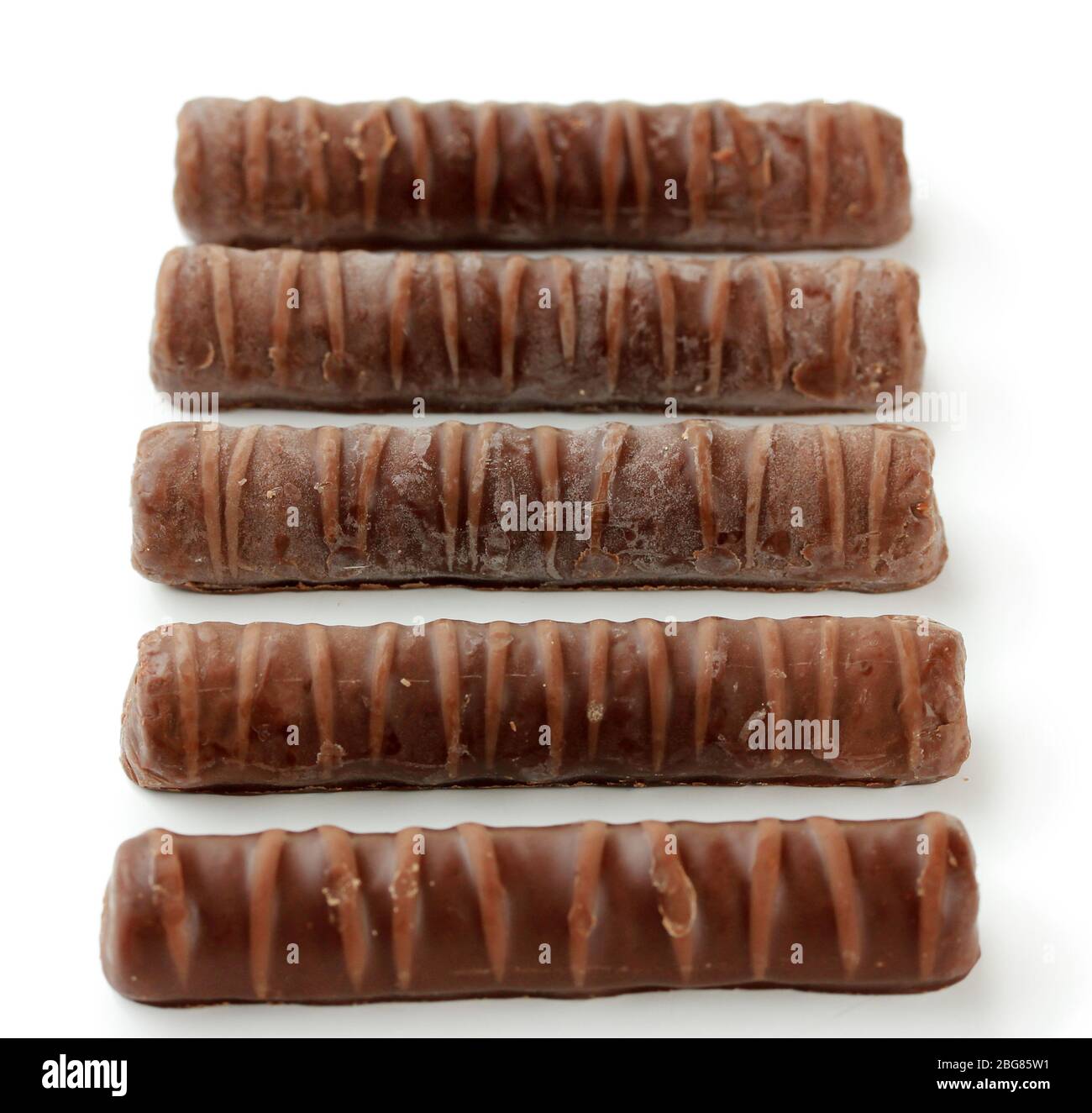Delicious chocolate bars isolated on white Stock Photo - Alamy