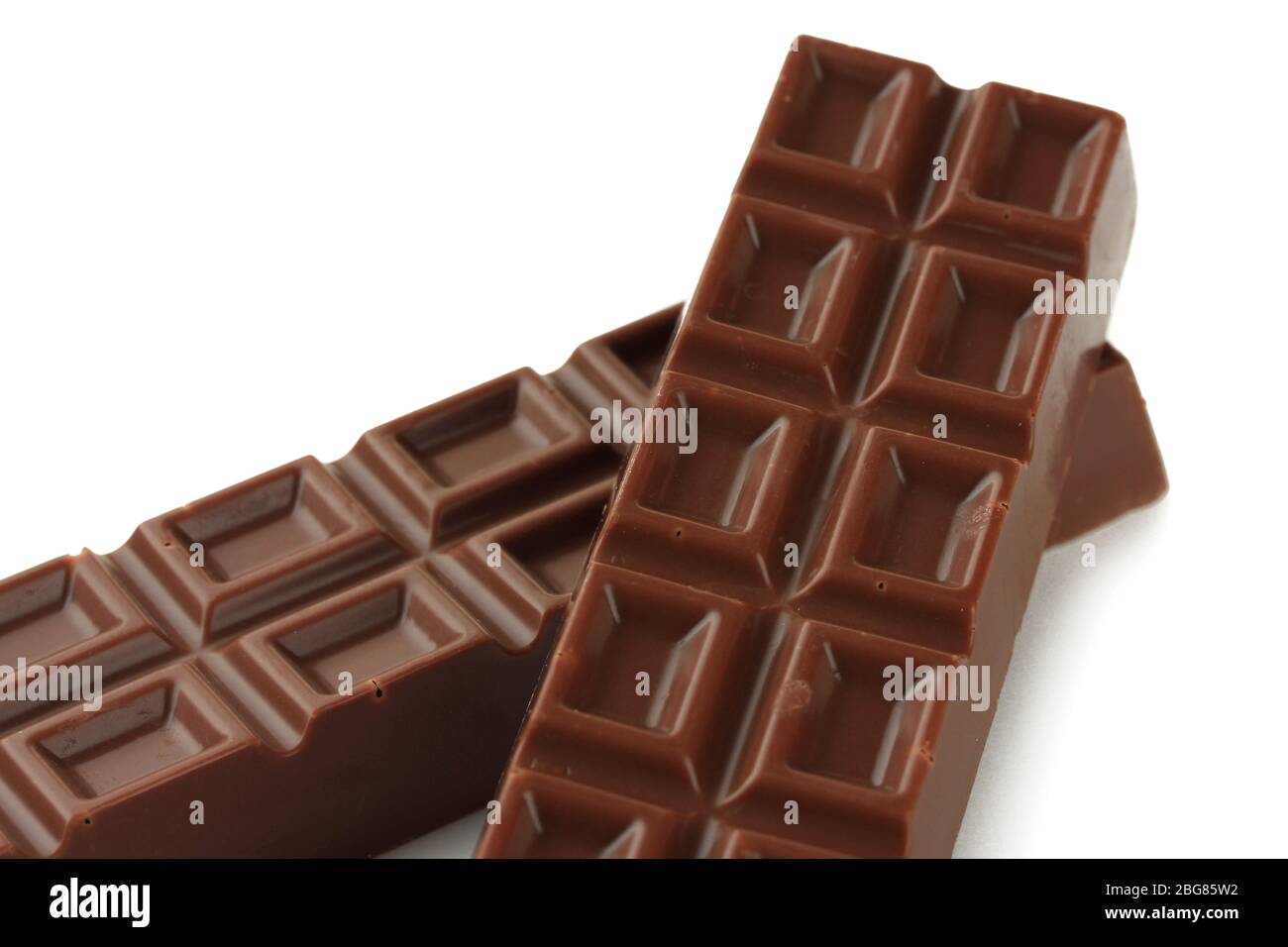 Two delicious chocolate bars isolated on white Stock Photo - Alamy