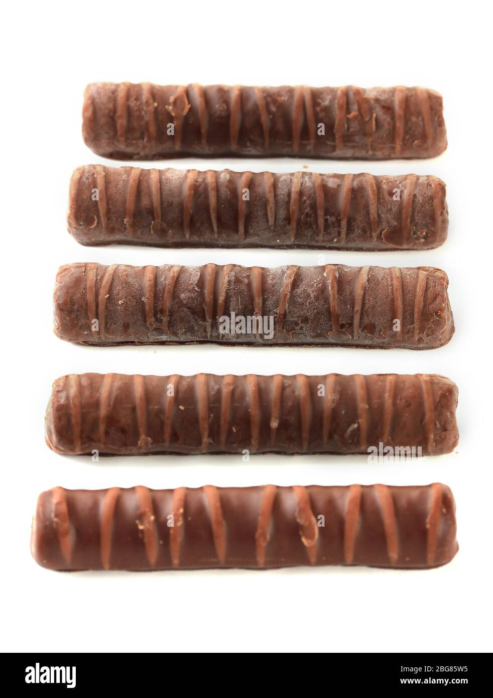 Delicious chocolate bars isolated on white Stock Photo - Alamy