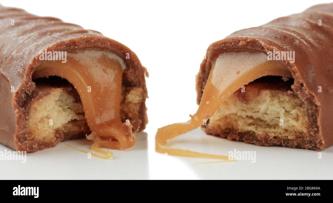 Delicious chocolate bars isolated on white Stock Photo - Alamy