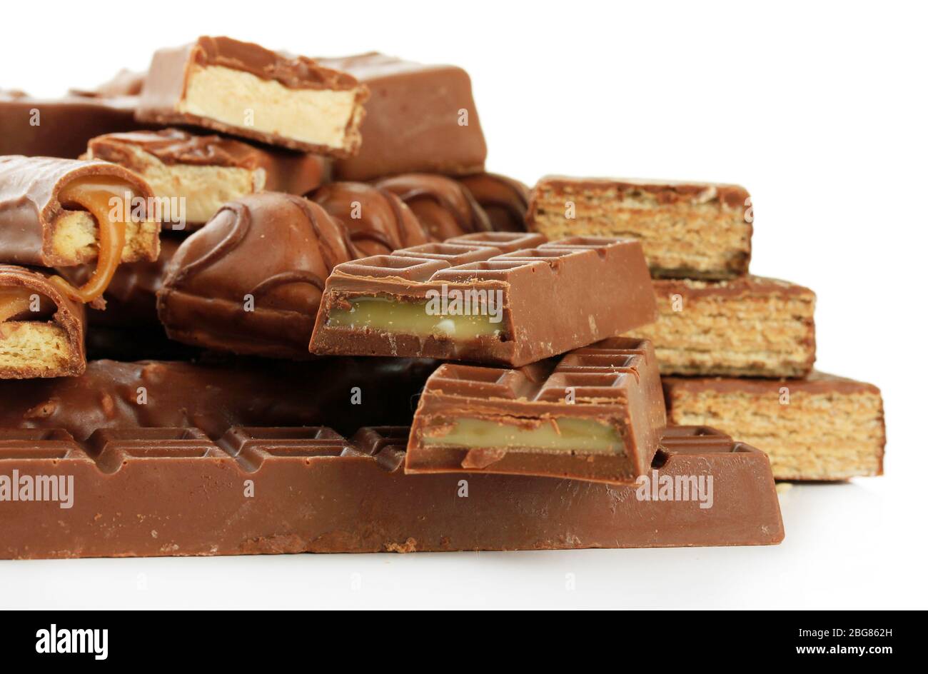 Delicious chocolate bars isolated on white Stock Photo - Alamy