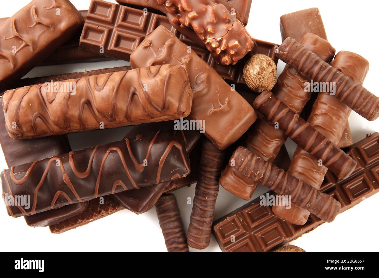 Delicious chocolate bars with nuts close up Stock Photo - Alamy