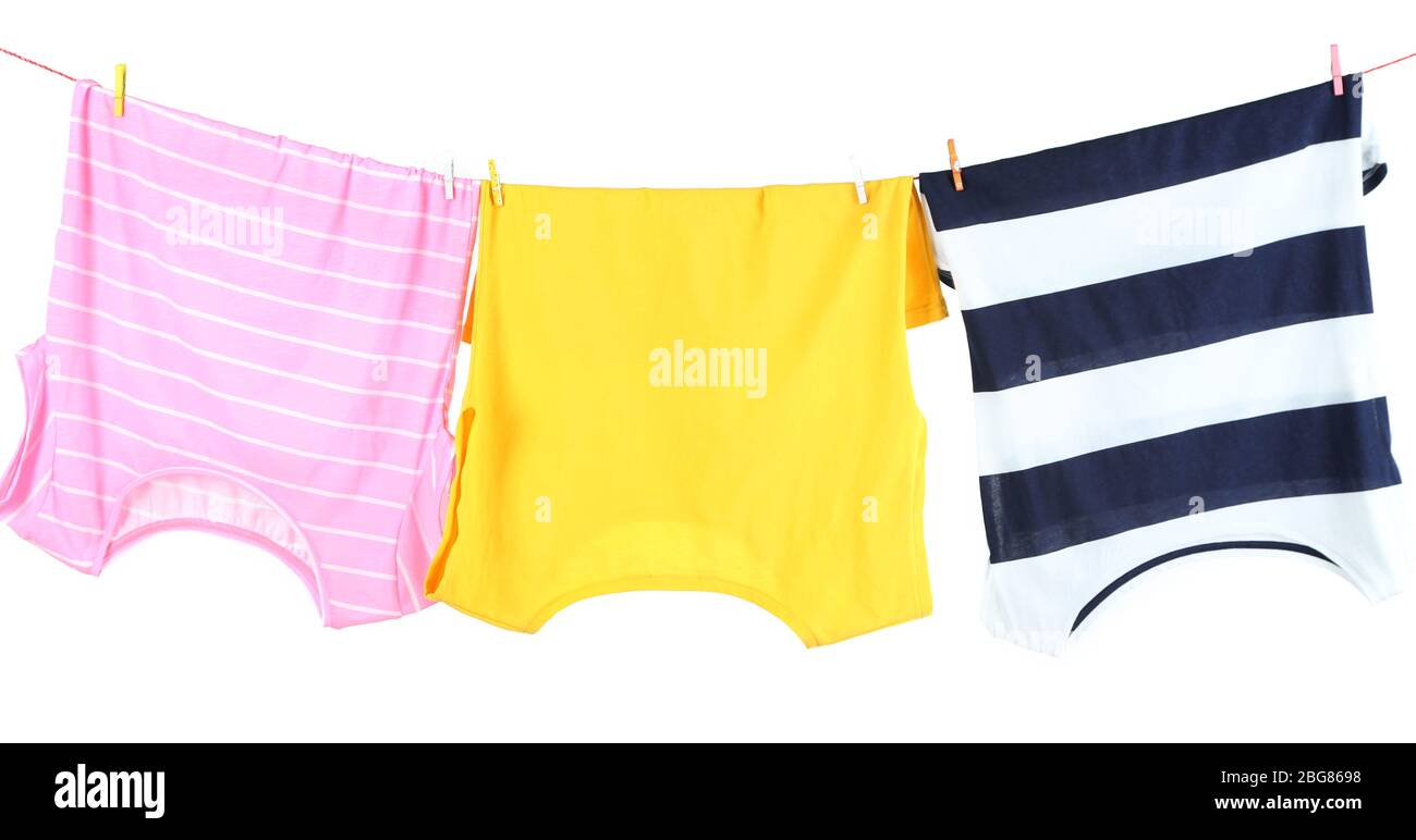 Clothes on rope isolated on white Stock Photo - Alamy