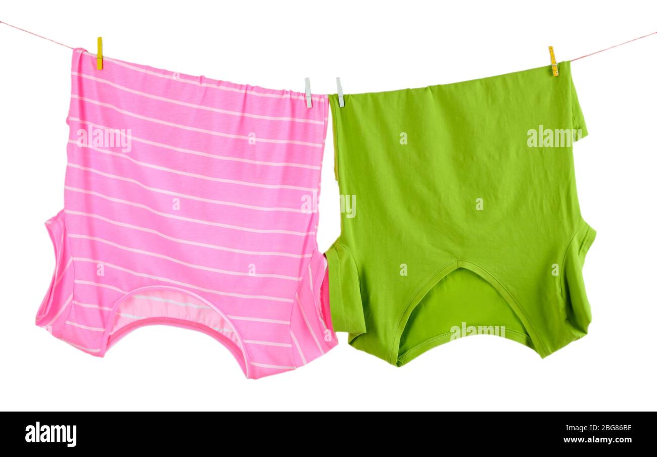 Clothes on rope isolated on white Stock Photo - Alamy