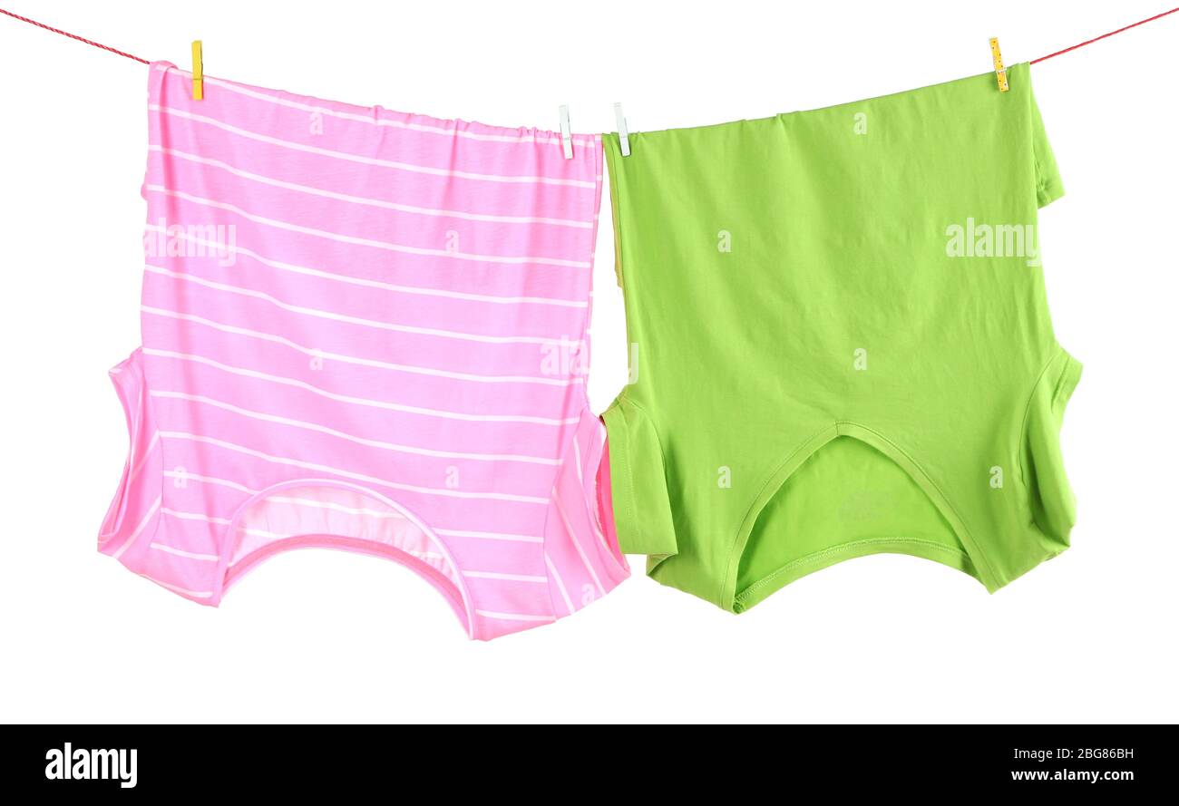 Clothes on rope isolated on white Stock Photo - Alamy