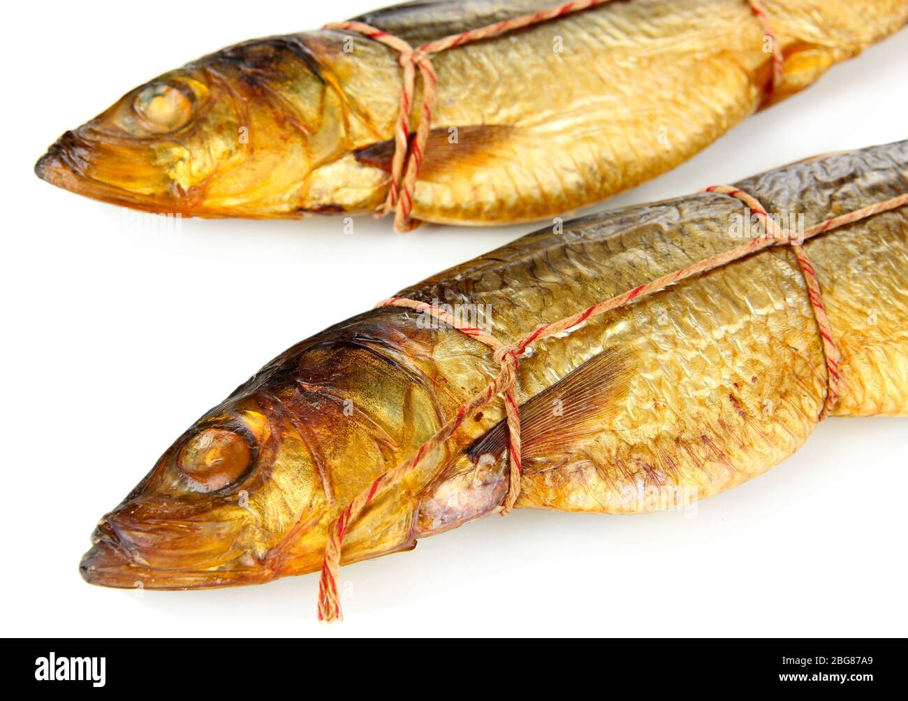 Smoked fish isolated on white Stock Photo - Alamy
