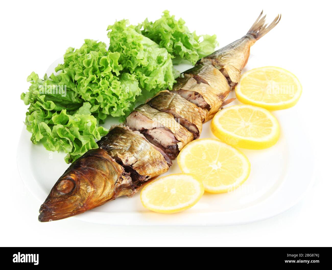 Smoked fish on plate isolated on white Stock Photo - Alamy